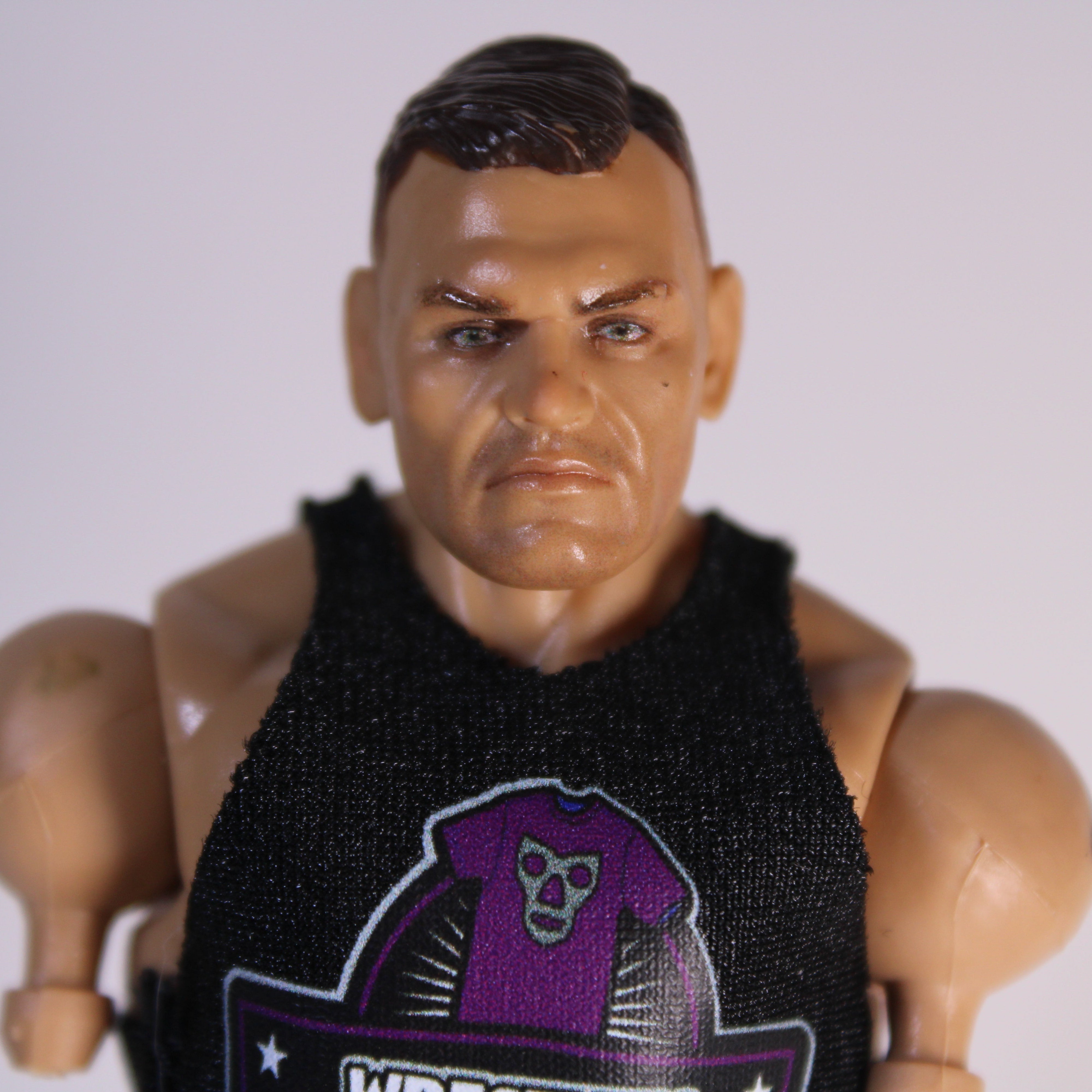 The Ring General G Loose Figure Head – Wrestling Figure Shirts